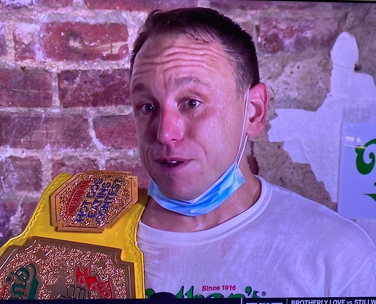 Joey Chestnut sets world record, downs 75 hot dogs in Nathan's Hot Dog ...